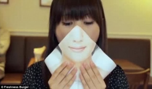 Japanese restaurant invents a mask to hide women’s faces as they scoff ...