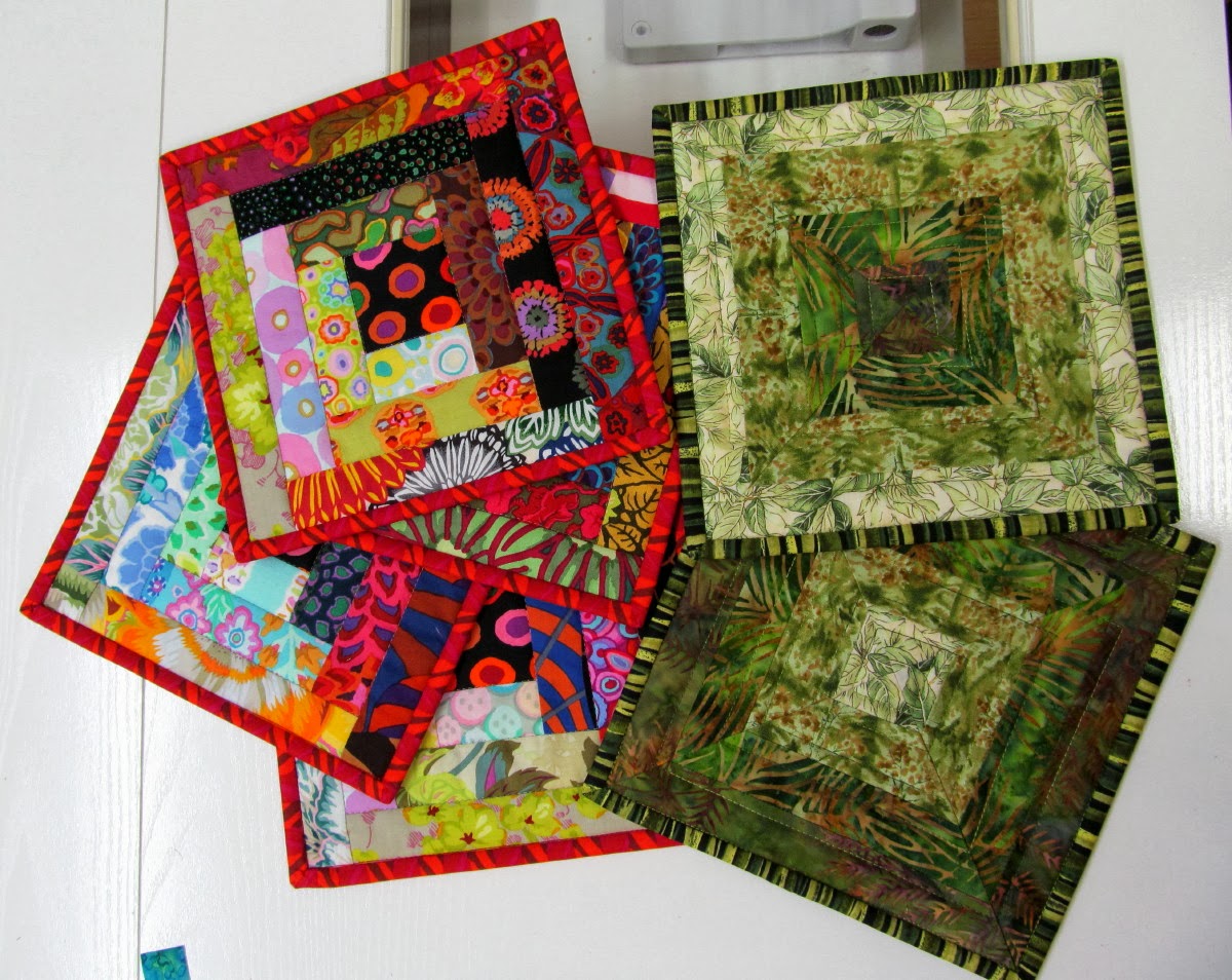 Exuberant Color : Binding the mug rugs.......