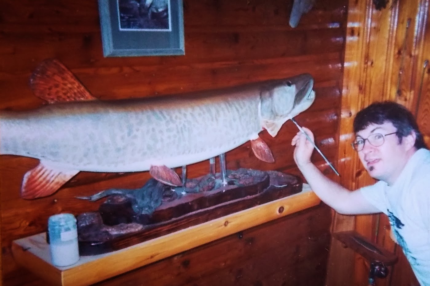 CHARLES WEISS ART: Repainting a wood carved Muskie at Vermilion Bay ...