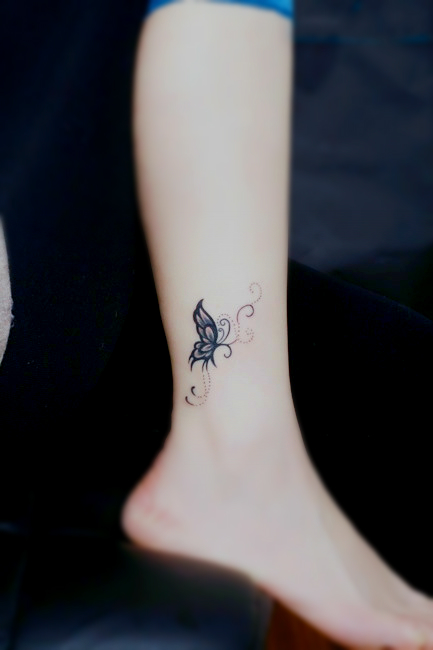 Free Tattoo Designs : Butterfly tattoo on the ankle