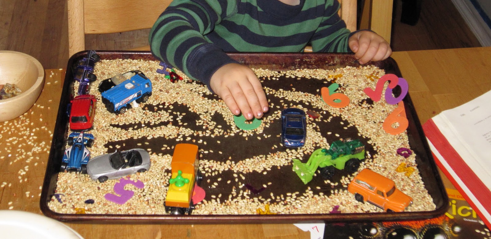 Rice Sensory Activity: Tray with Toy Cars