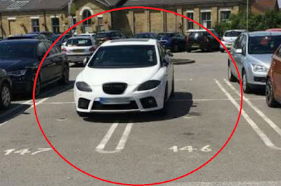 World's most selfish car owner? Man takes up 4 spaces to park his car ...