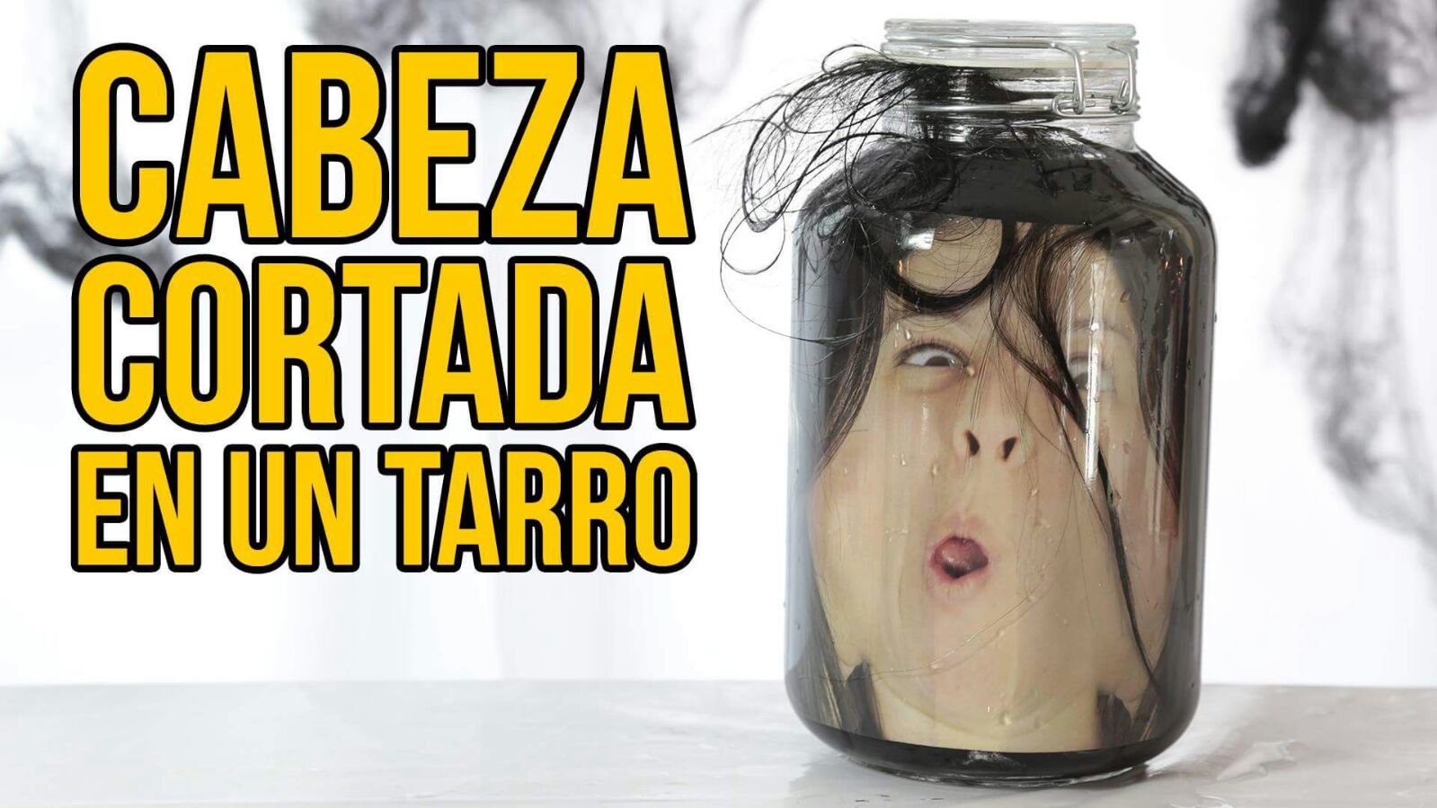 cabeza cortada en un tarro