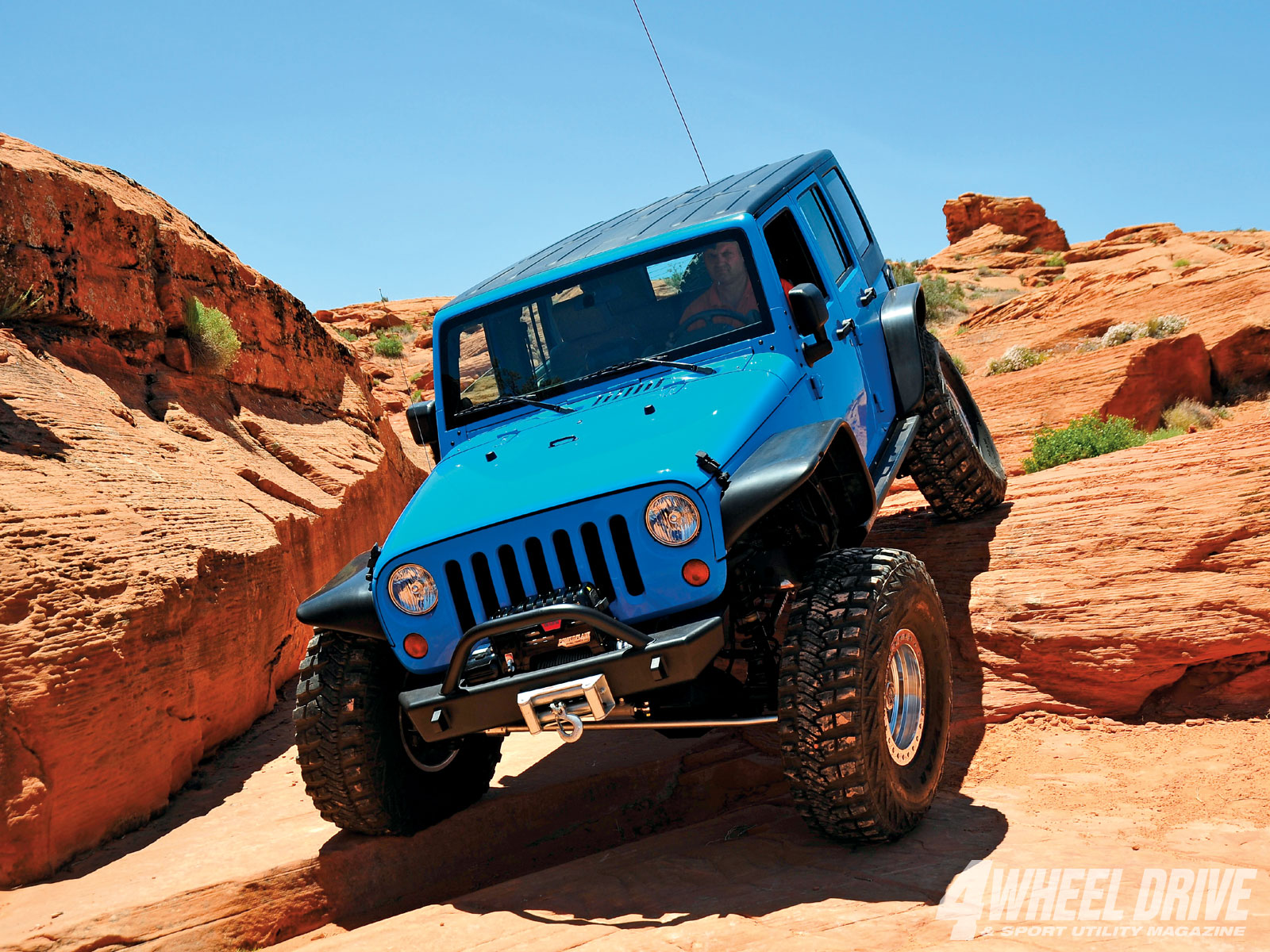 HD Wallpapers: Blue Jeep on Rocks....
