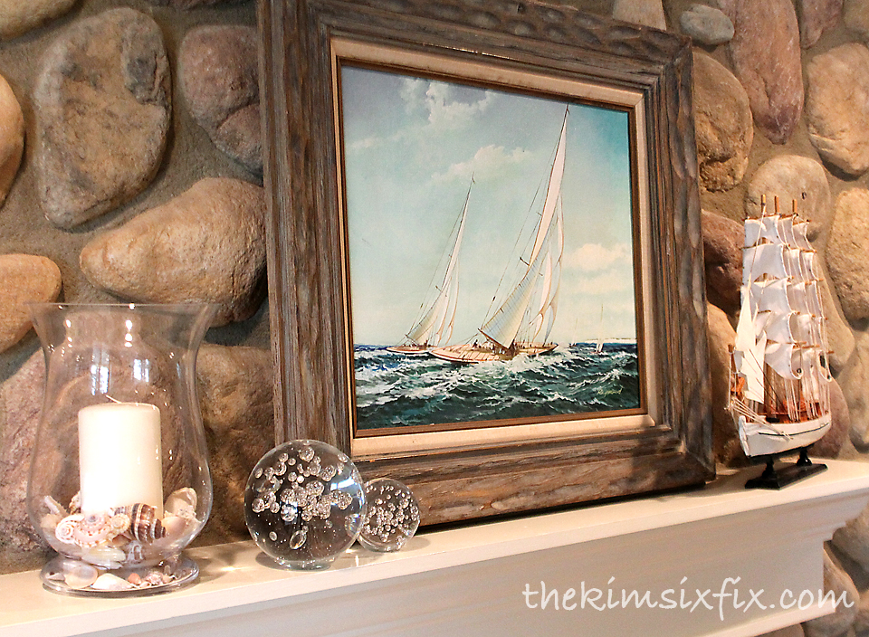 On one end she has a thrift shop model tall ship: