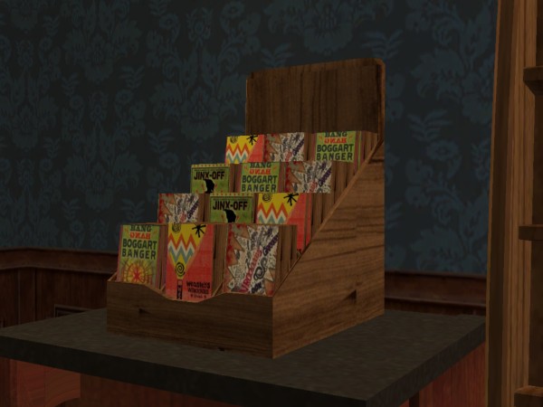 Decat's Sims 2 Creations: Quibbler magazine rack and Weasley game racks