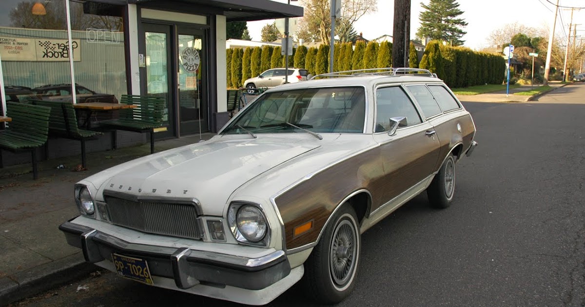 OLD PARKED CARS.: 1976 Mercury Bobcat Villager.