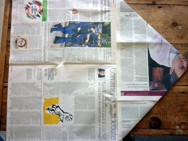 sixty one A: Recycled paper helmet