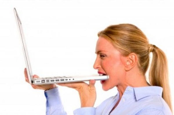 Boredom Crusher: Stock Photos Of Women Biting Laptops (And A Mouse ...