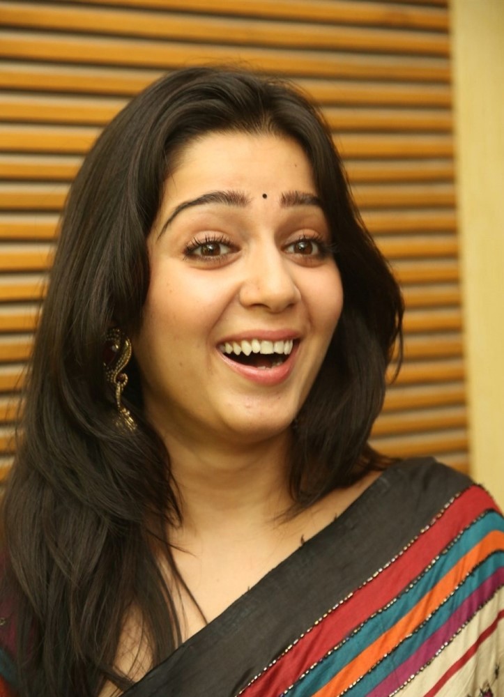 Charmi Kaur Latest Cute Smile With Hot Glamour PhotoShoot Images In ...