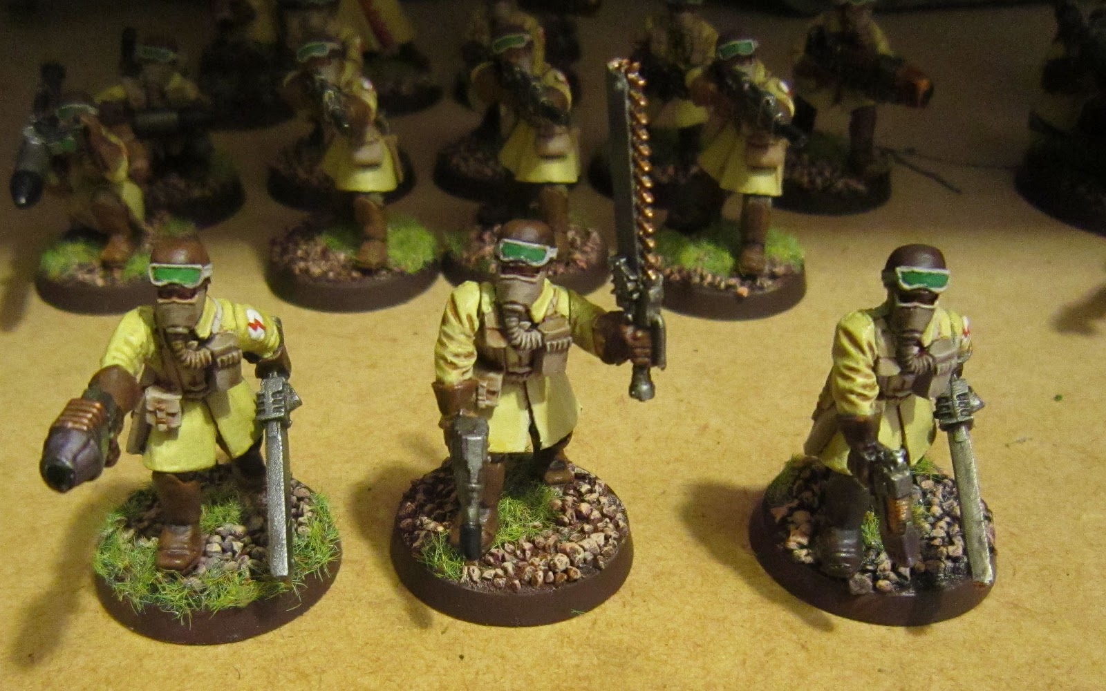 Artificer's Workshop Visions: Steel Legion Sergeants with Orks Head
