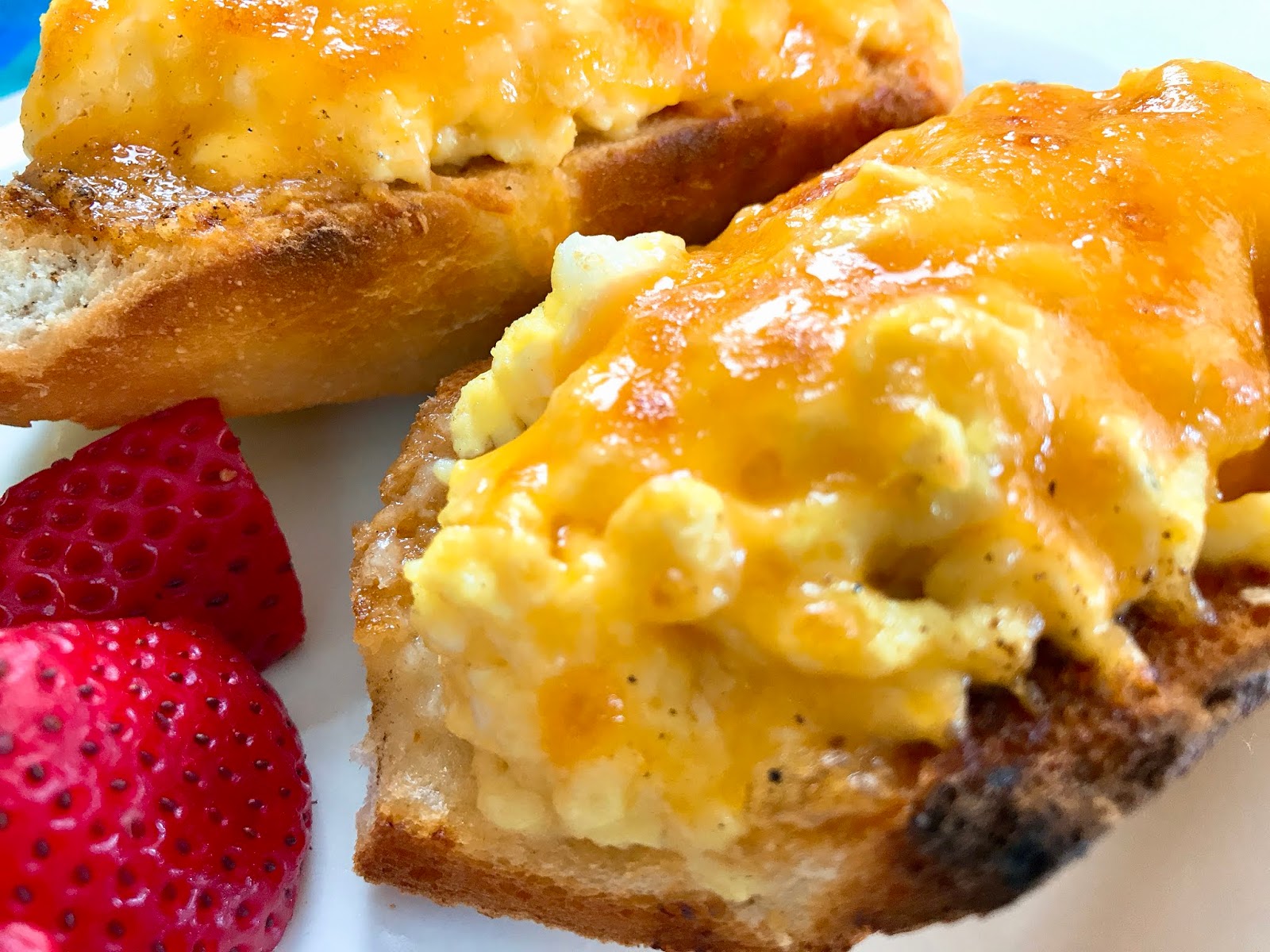 Cheesy Scrambled Egg Boats