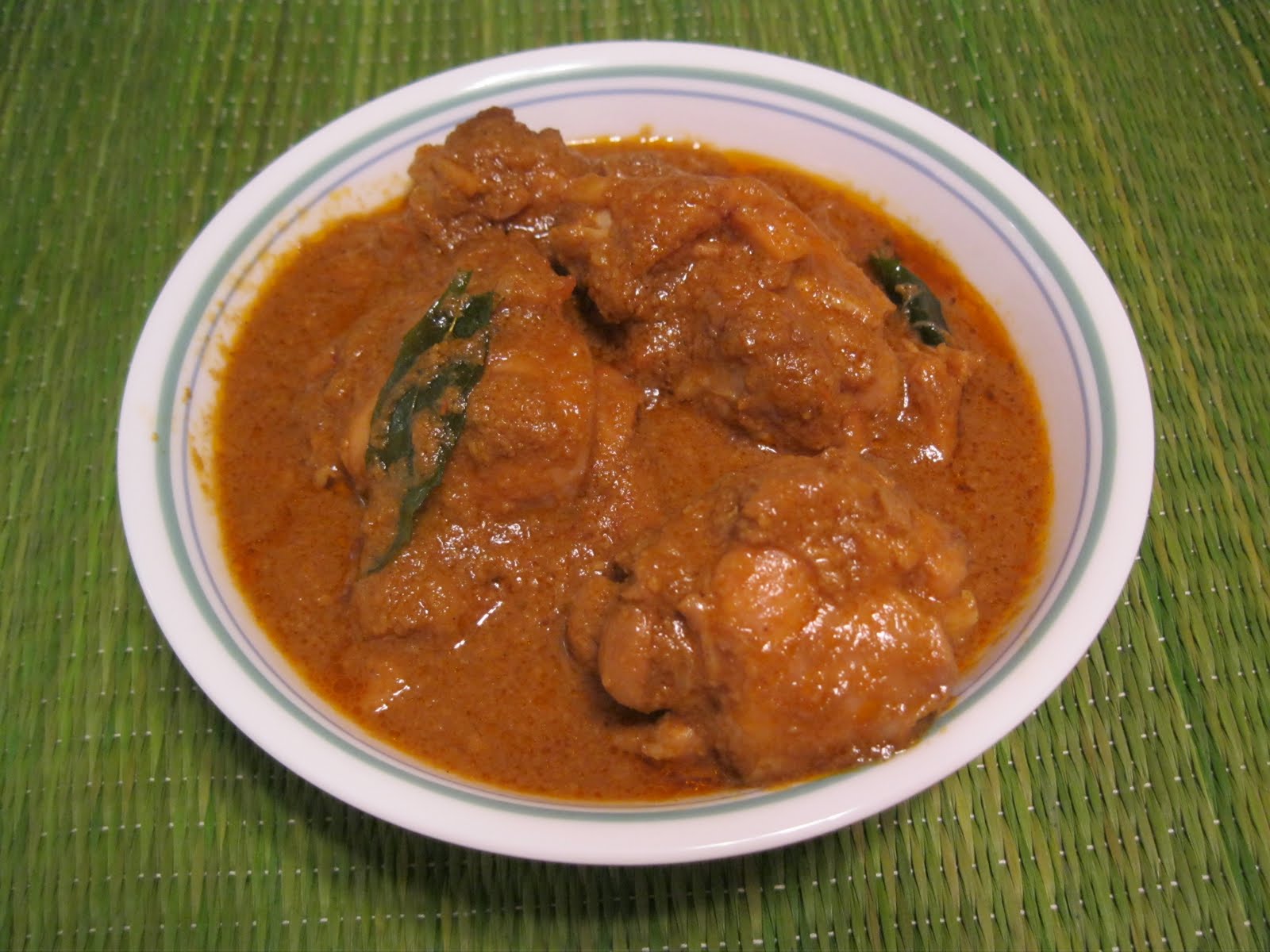 Classic Kerala Cuisine: Varutharacha Kozhi curry