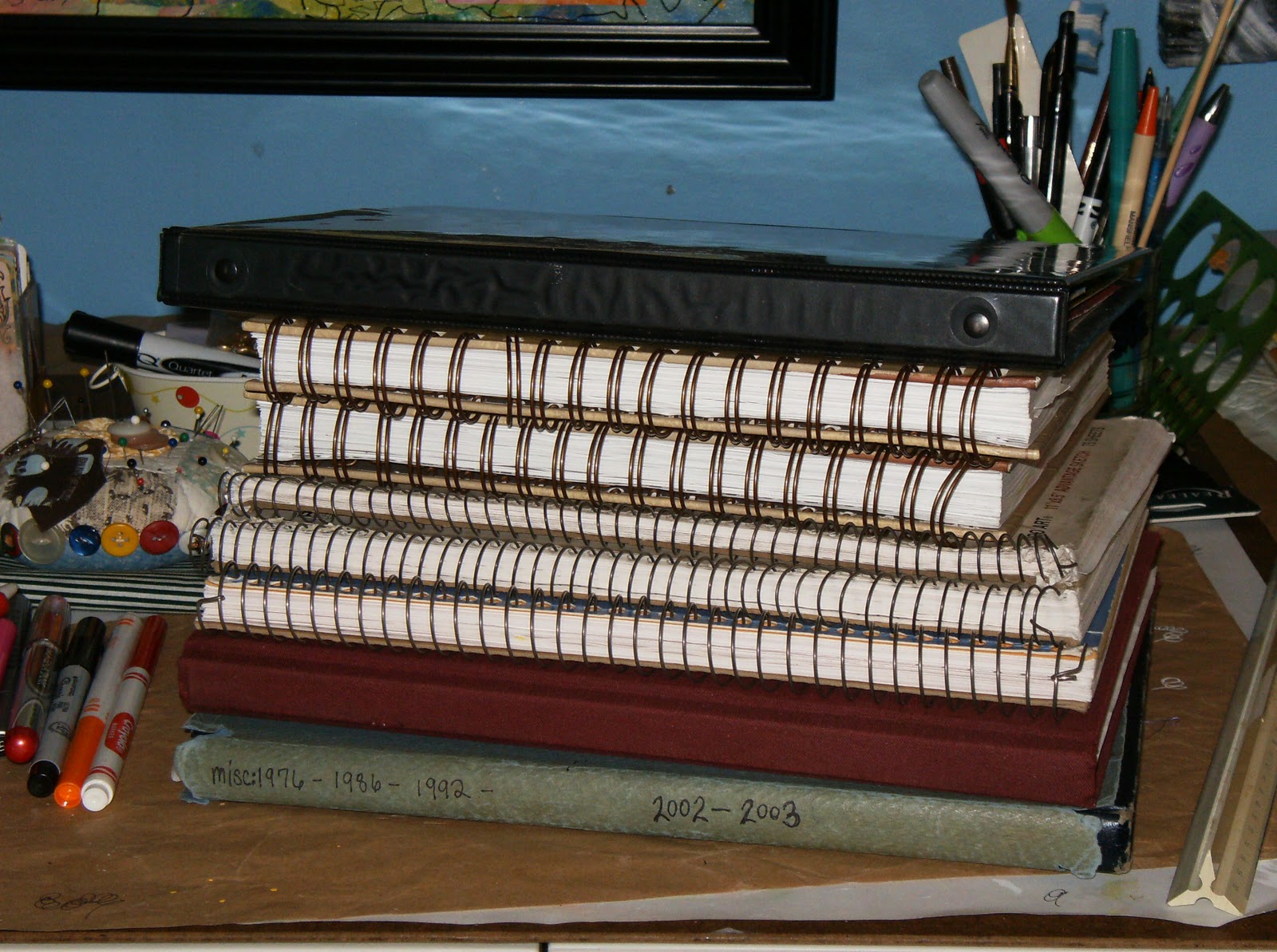 Art Beneath the Cottonwoods: Stacks of Art Journals and Books