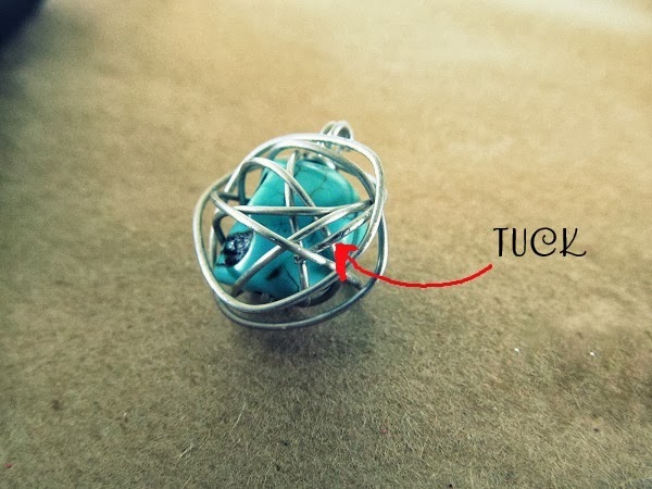 WobiSobi: Wire Wrapped, Skull Charm.