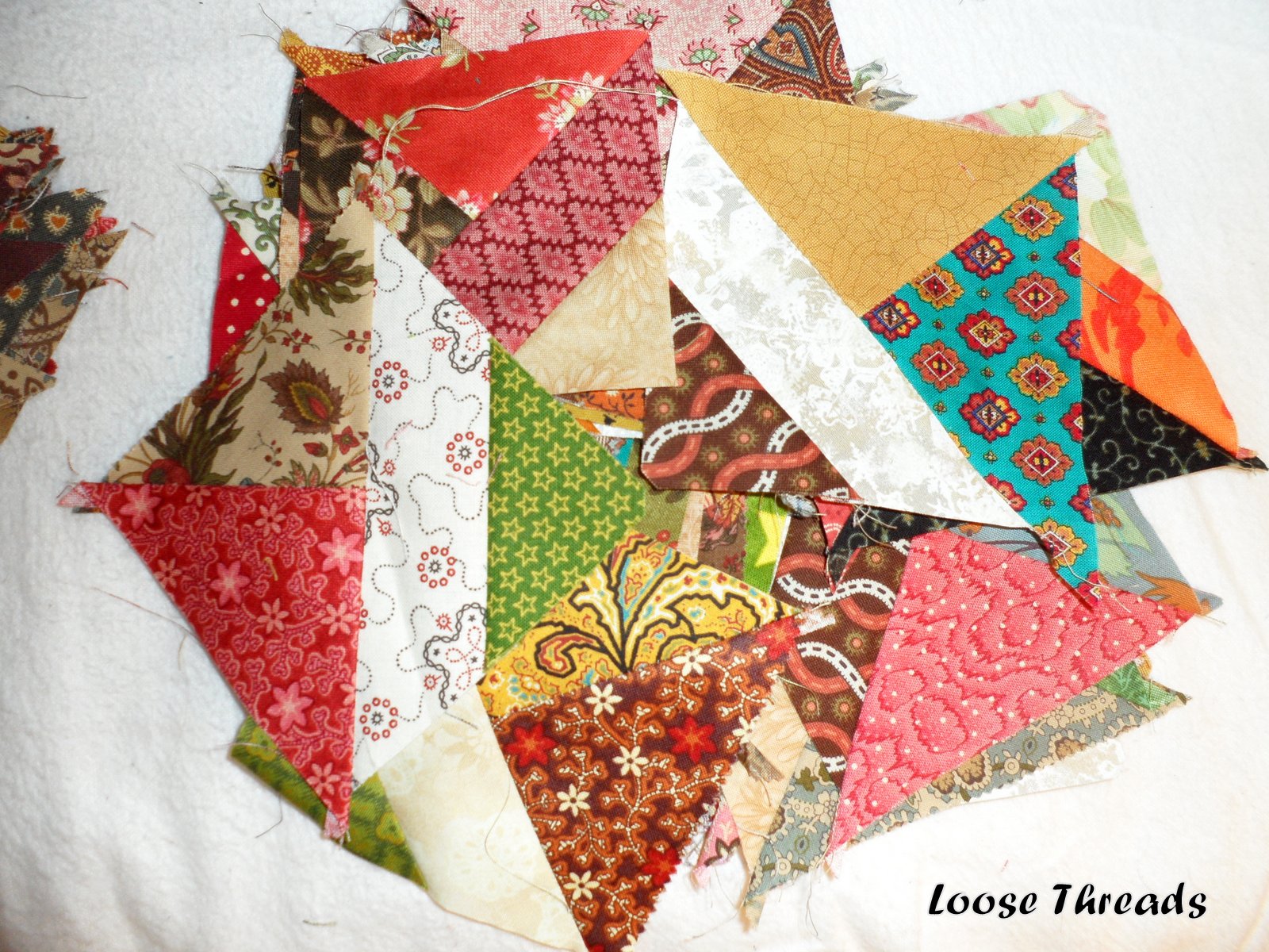 Loose Threads: Strips and Triangles Scrap Quilt