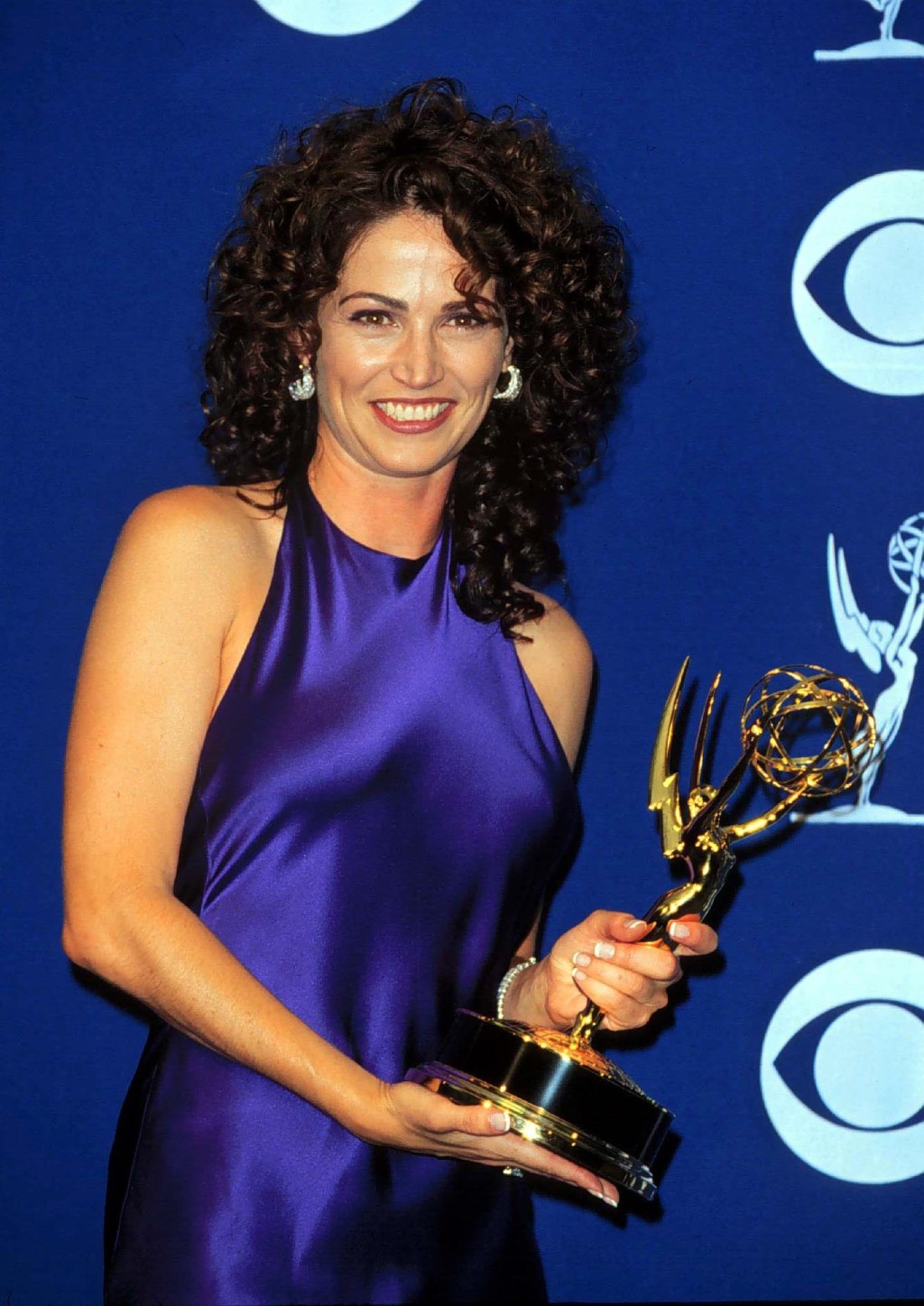 Ladies in Satin Blouses: Kim Delaney - blue satin dress