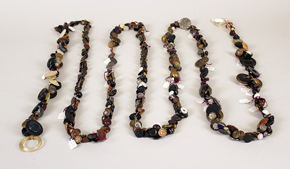 Heroes, Heroines, and History: Antique Buttons, Charm Strings, and Folklore