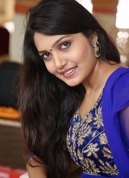 Vardana new stills in blue dress - Telugu Cinema Samacharam