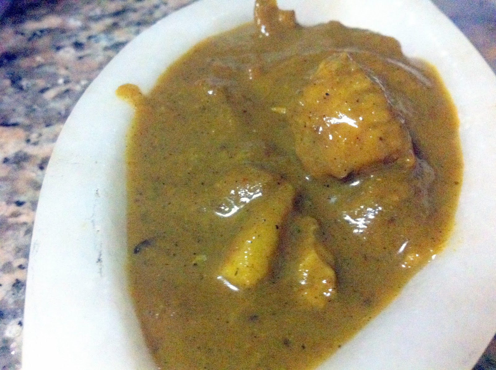 Fish fillets cooked in Roasted Onion-Garlic Curry | the spice whisperer