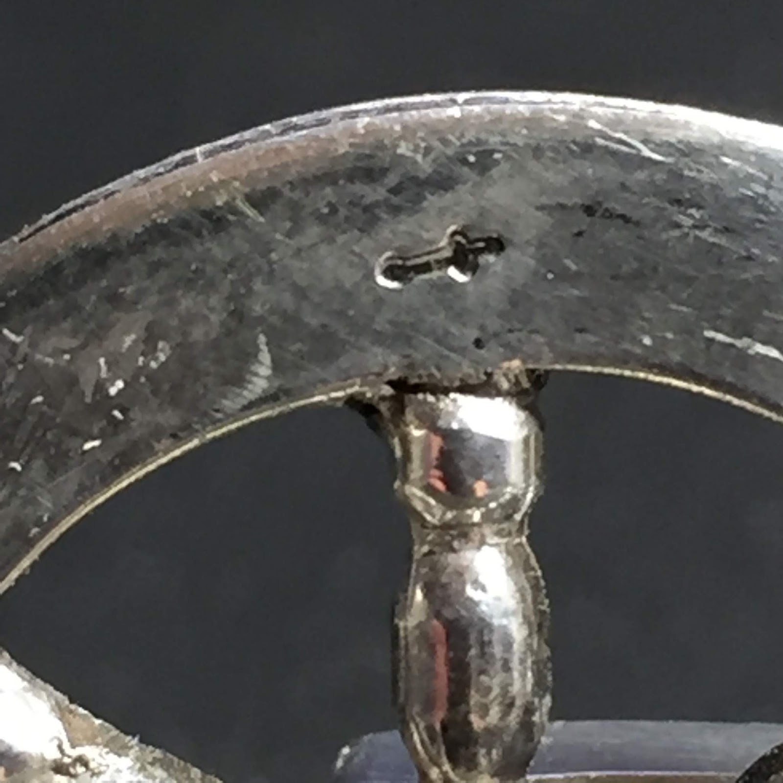 Silver spinning wheel