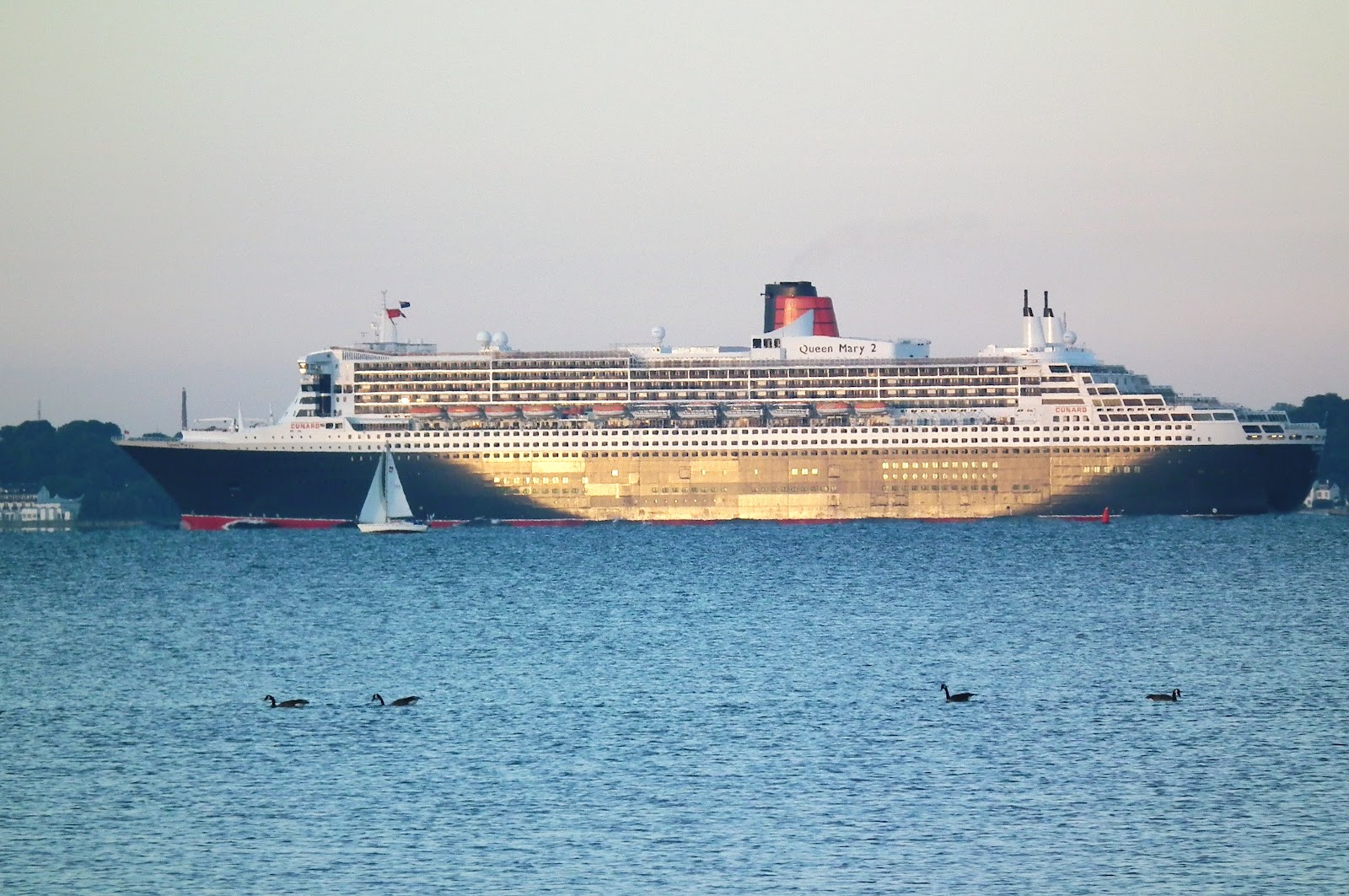 The Things I Enjoy: Mirage:The Queen Mary 2 floating in the air
