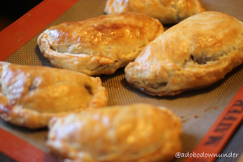 adobo down under: Beef and burgundy pies, calzone / empanada