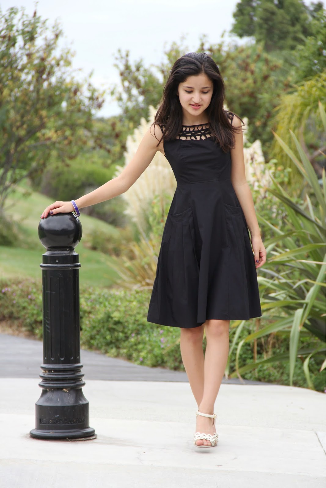 Little Miss Haute Couture: Loops, Lace, and a Little Black Dress