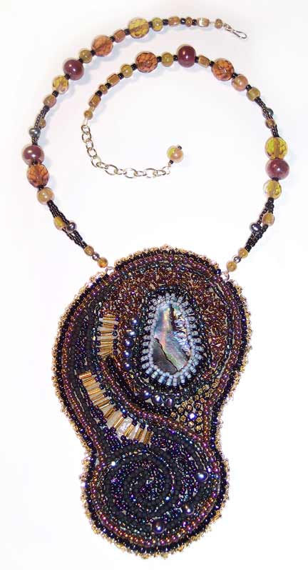 Bead embroidered paua shell centerpiece