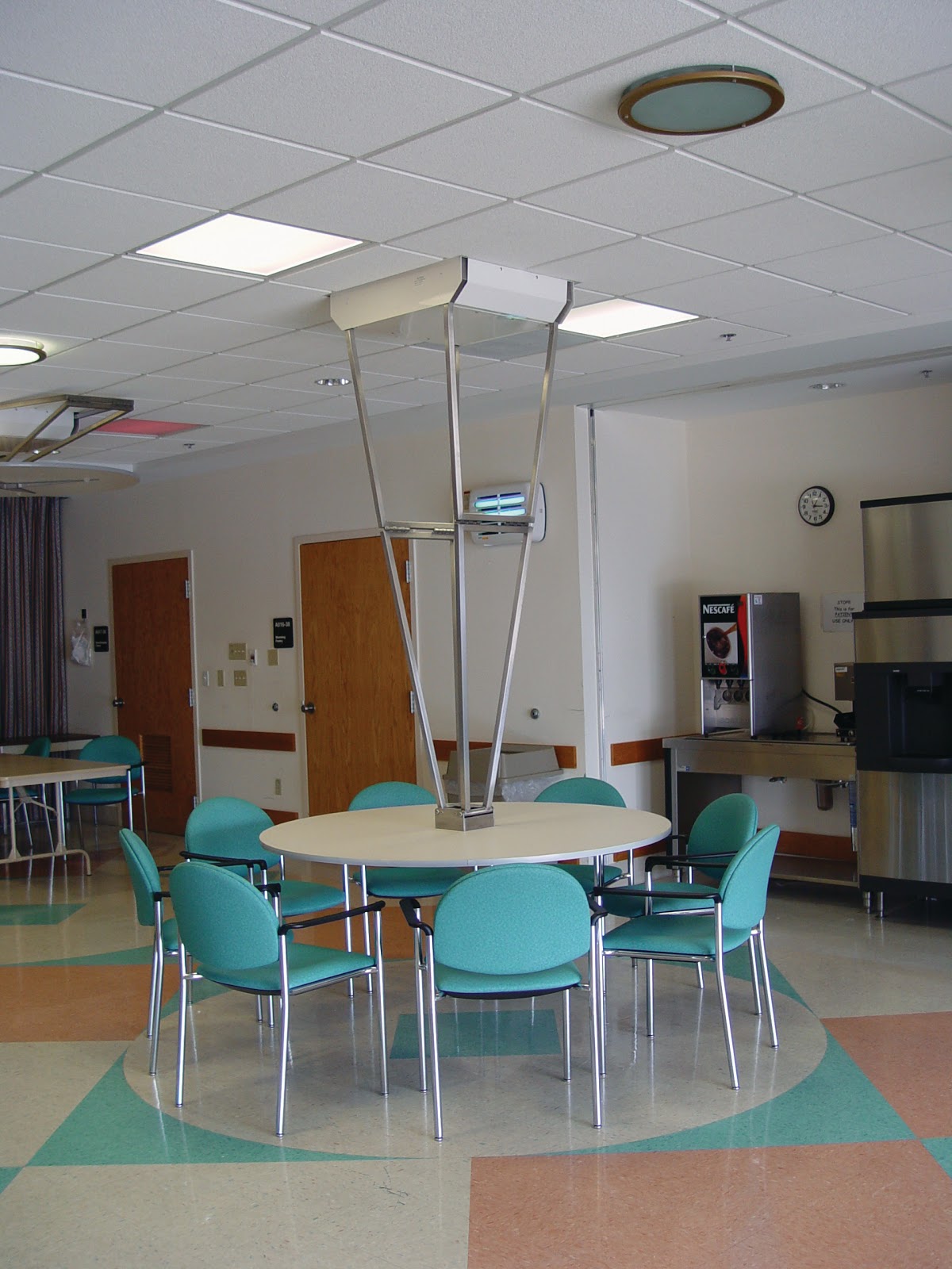 A Cracked Door: Ceiling Mounted Tables