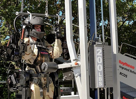 Raytheon XOS 2 Exoskeleton : robots that provide additional strength to ...