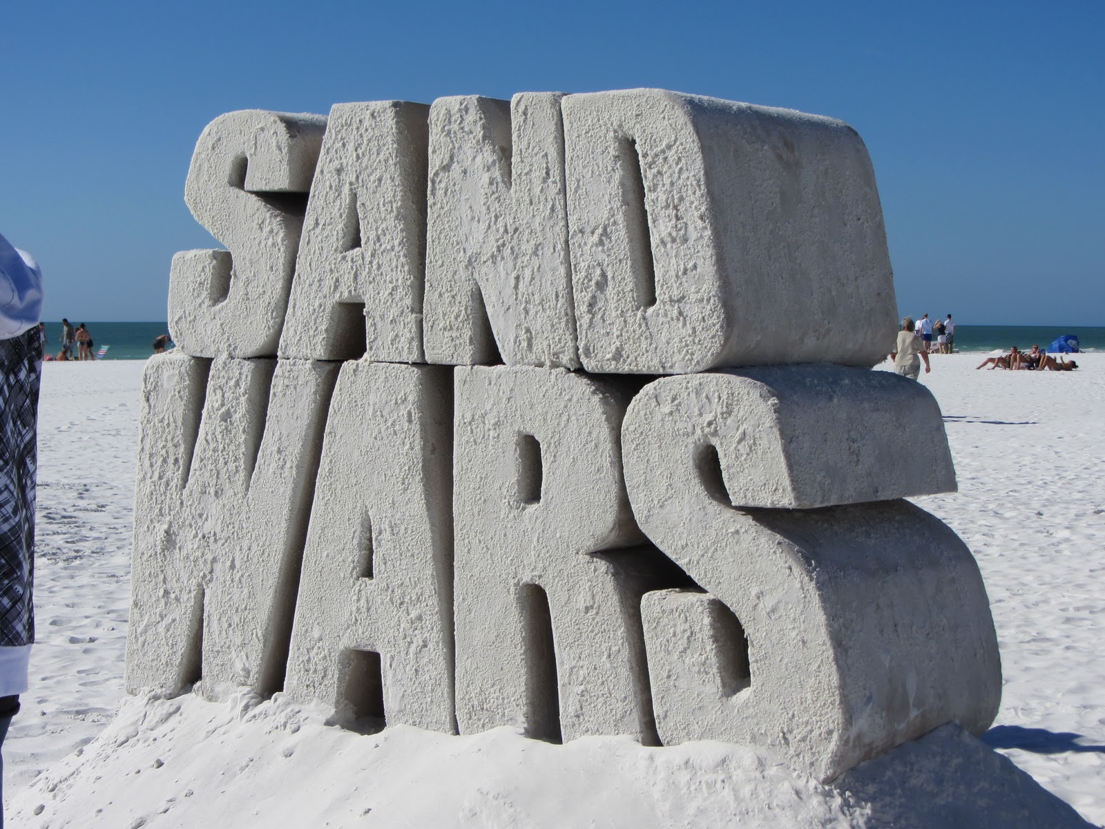 Paper Cut Screams: Sand Wars on Siesta Key
