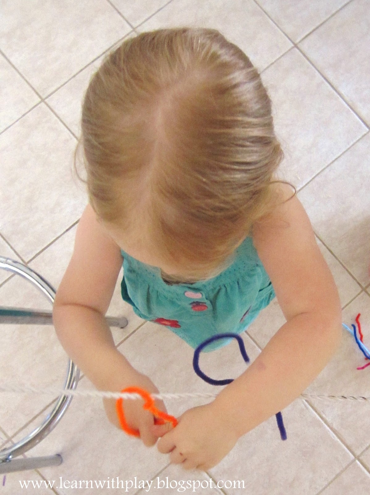 Learn with Play at Home: Fine Motor: Pipe cleaners on a String