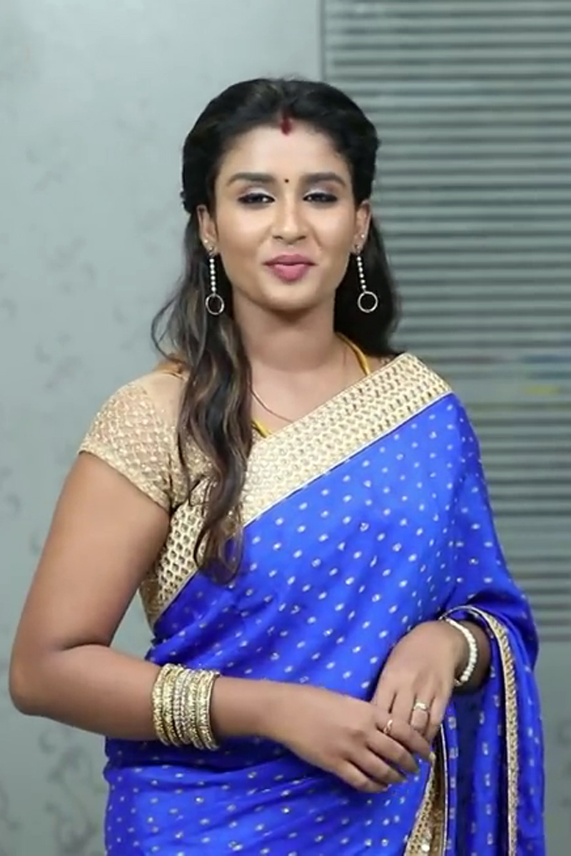 Actress Reshma Reya Beautiful Stills In Blue Saree