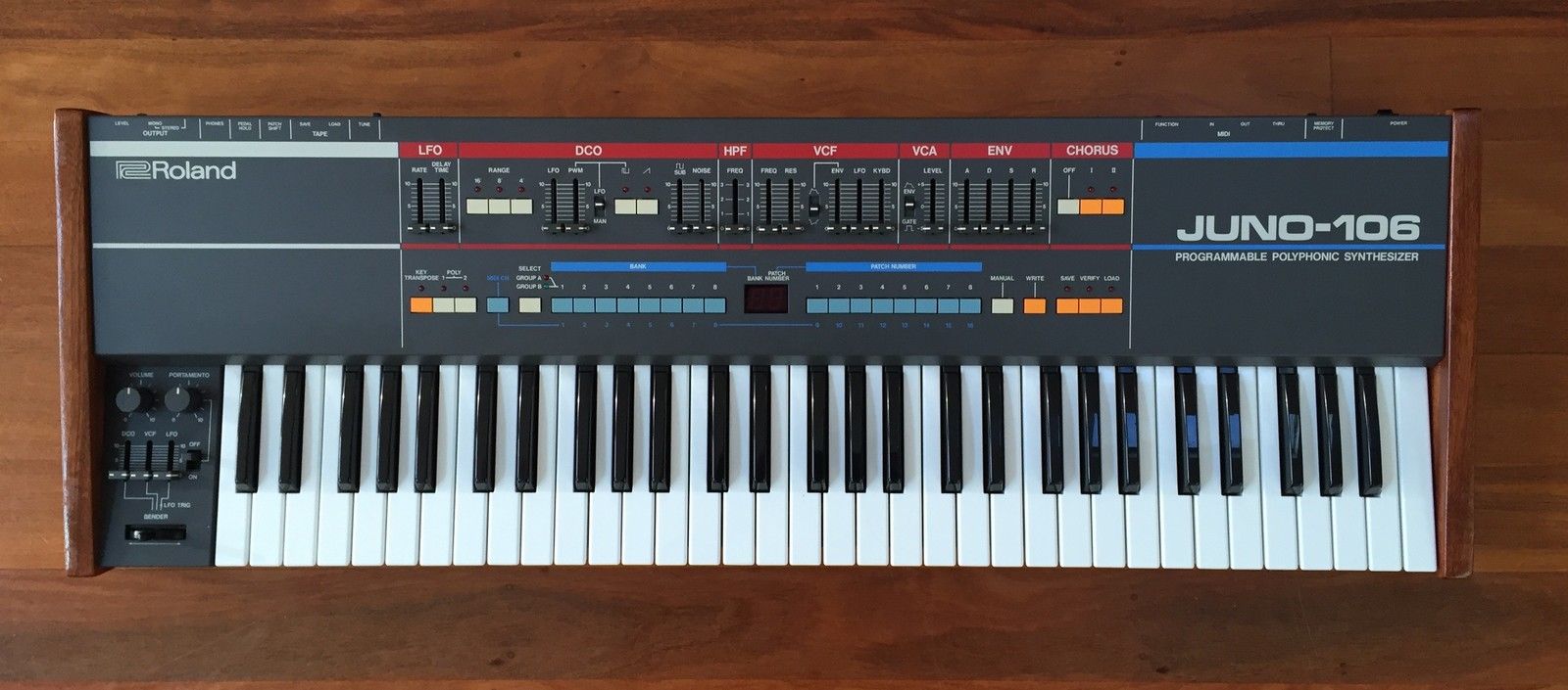 MATRIXSYNTH: Mint Roland Juno 106 with Wood Side Panels