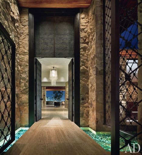 sixteen sunbuckles: jennifer aniston's beverly hills home