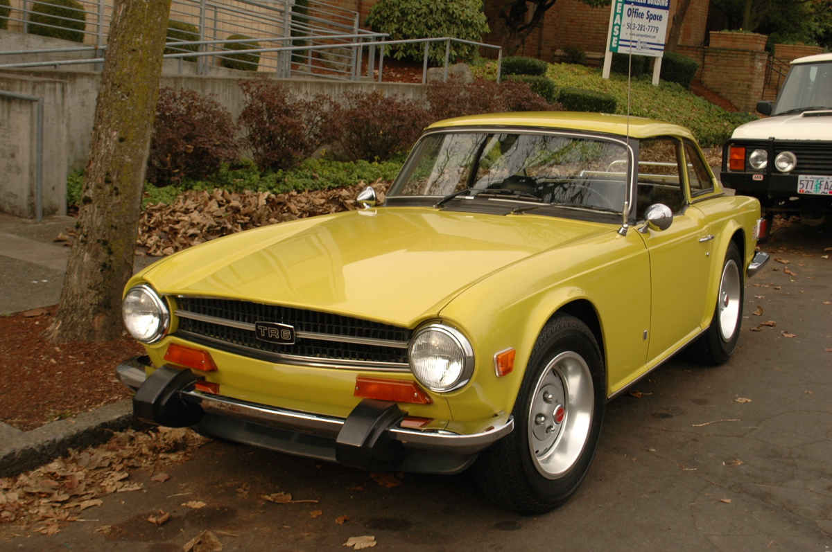 OLD PARKED CARS.: 1974 Triumph TR6.