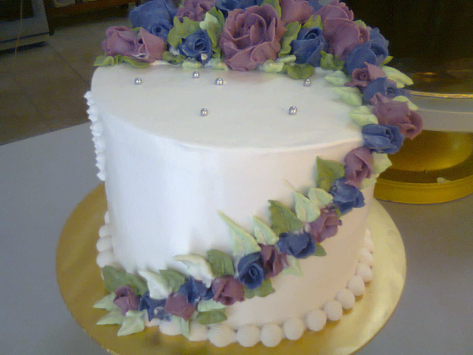 deliciouzbakery: 2 Tier Buttercream Wedding Cake with blue & purple colour