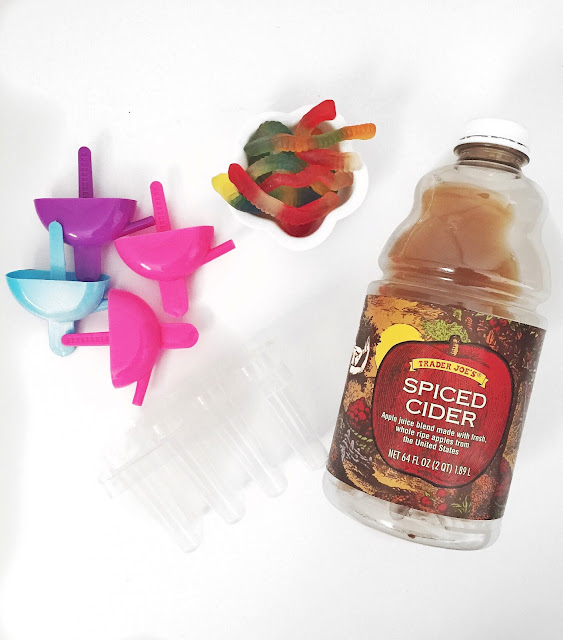 Pucker Up Style: Apple Cider Popsicles With Gummy Worms Inside.