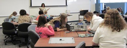 IBM Women in Technology Group helps Girl Scouts to use Computers in ...