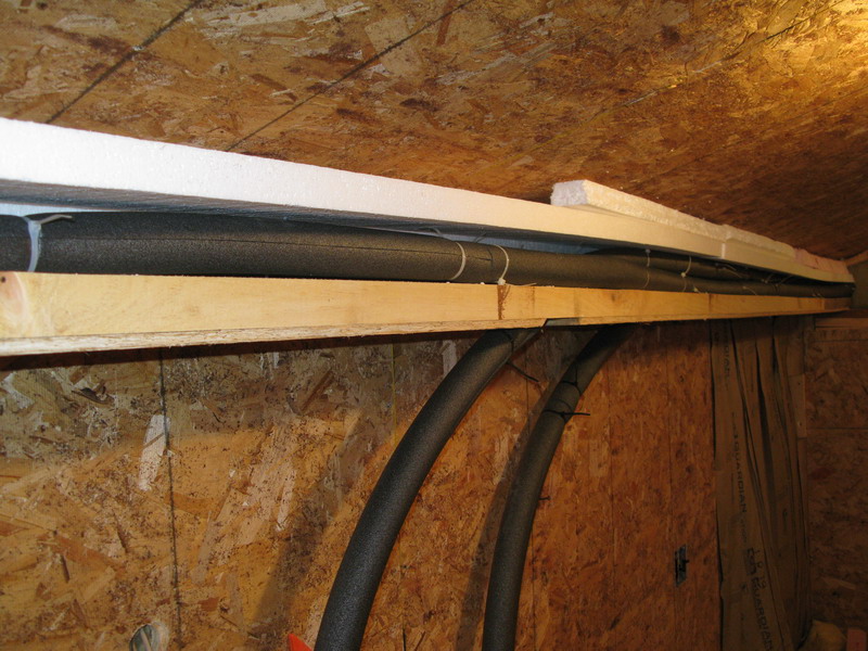 My Garn Adventure: Insulating Pipes andclosing in the soffit.