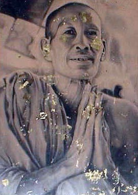 Buddhist Amulets: Luang Por Opasi Monk Coin