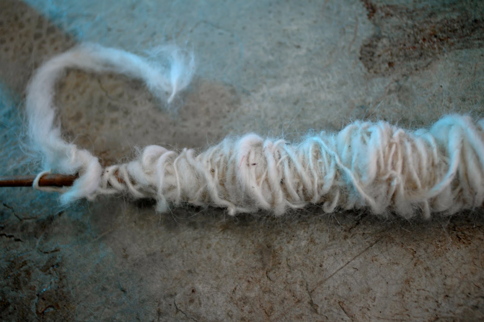 Artists Helping Artisans: Preparing wool stage 2 - brushing and spinning
