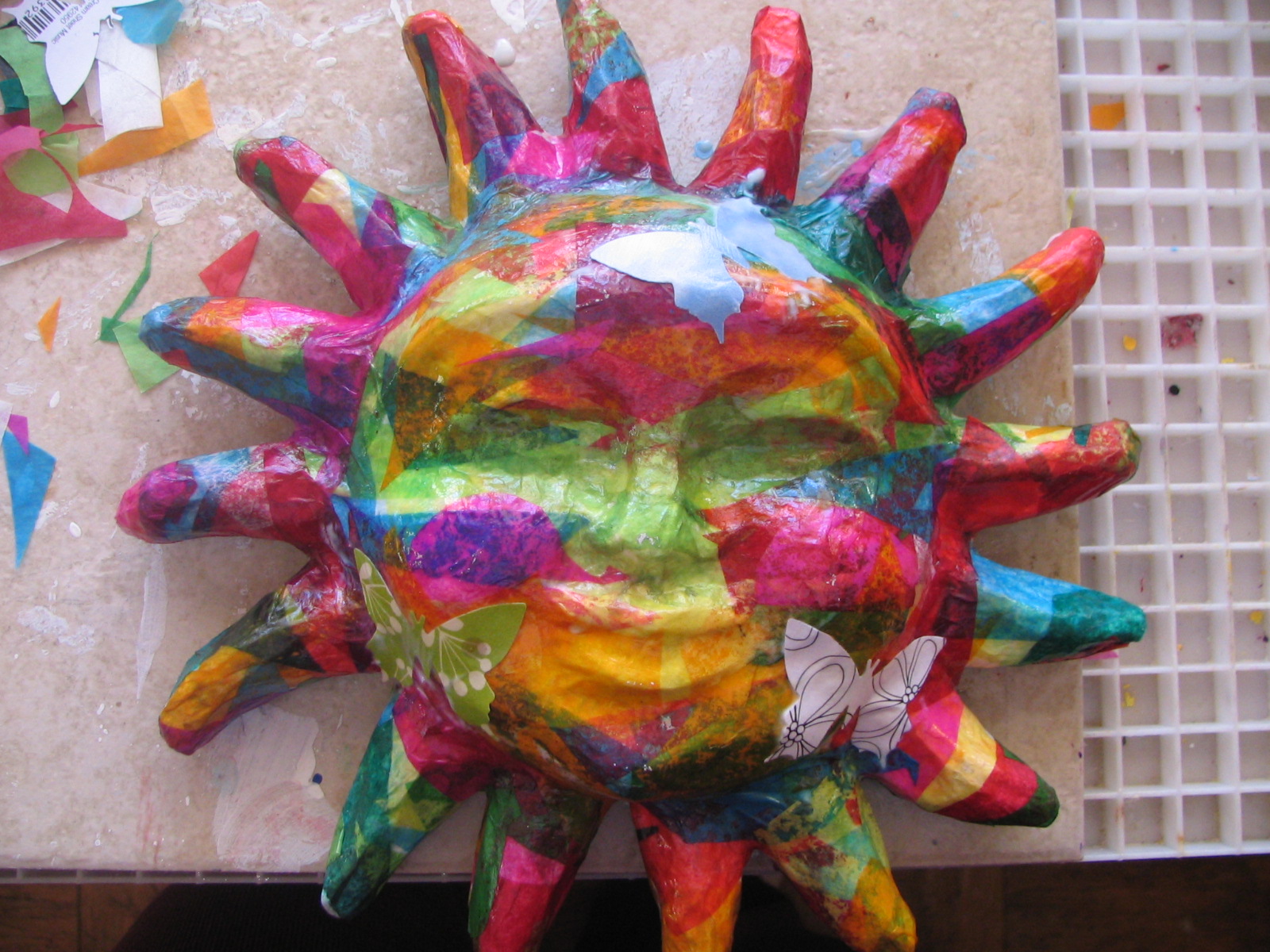 The Holiday HoHo Queen: Rainbow paper mache' Sun