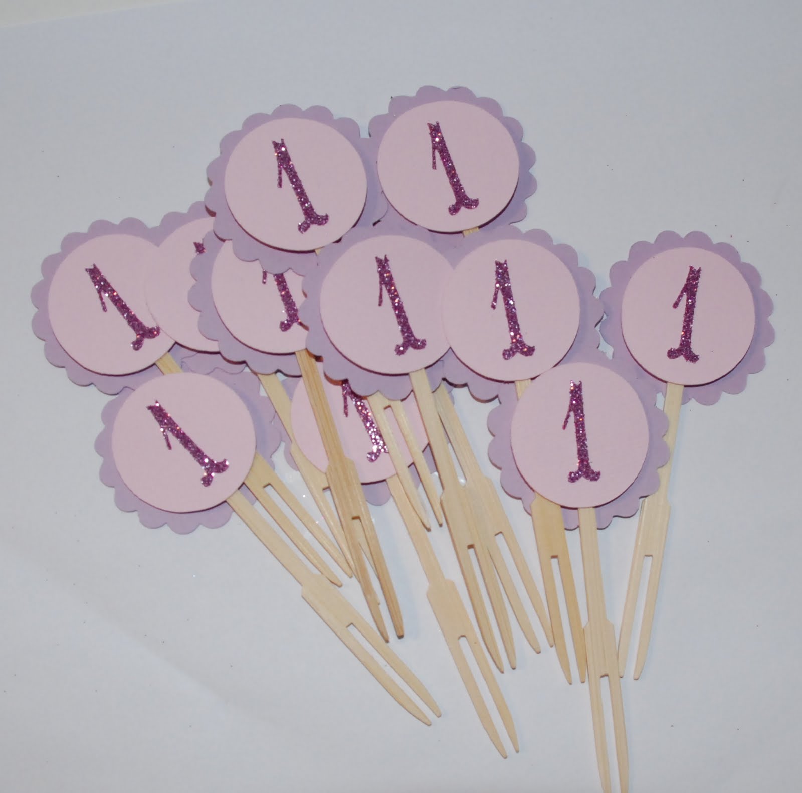 Cake Face Toppers: Purple and pink glitter birthday cupcake toppers.