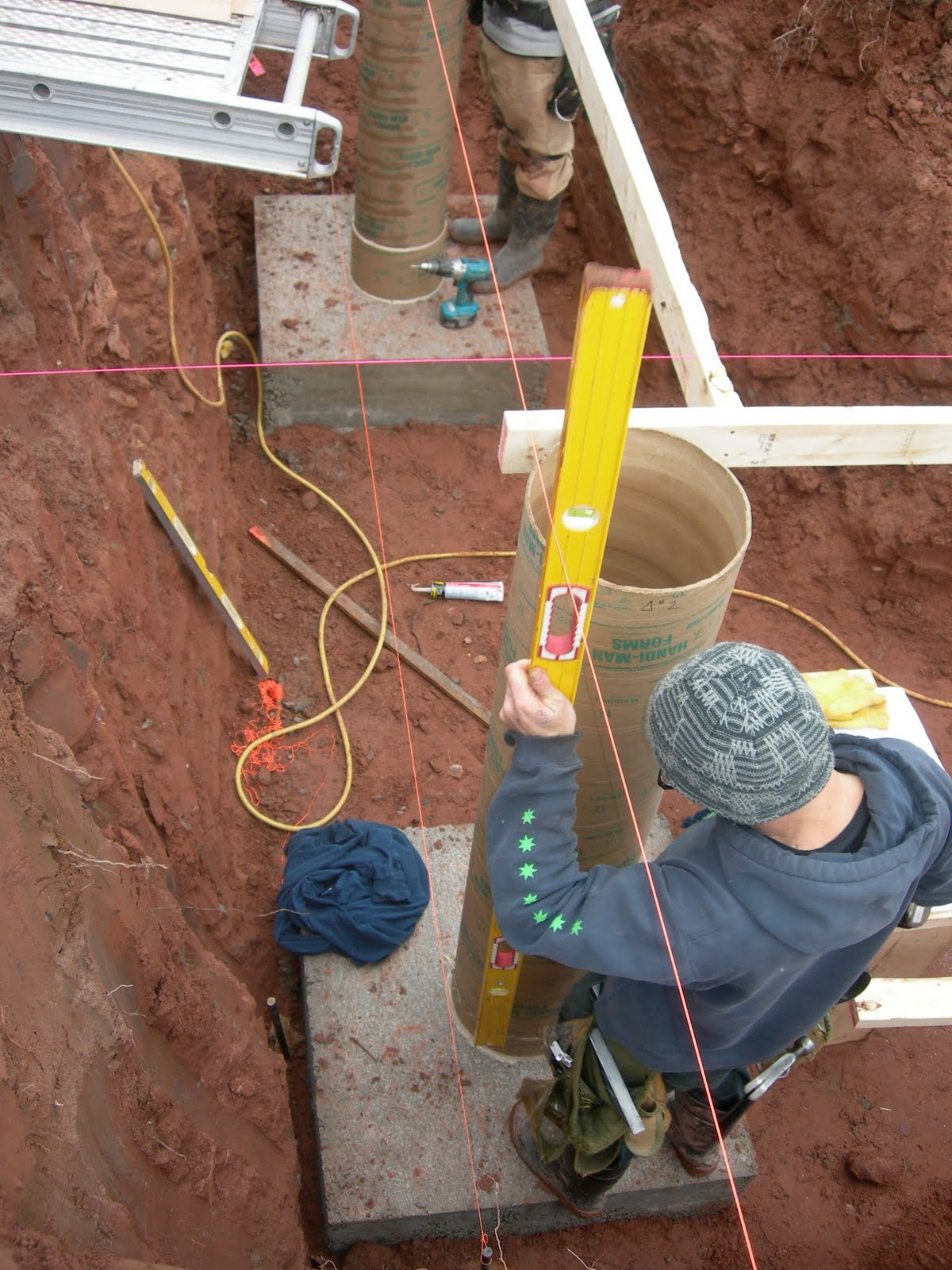 Apostle Highlands Home: Setting the porch and deck piers
