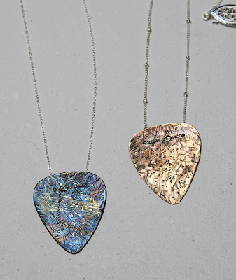 Amber Allena Jewelry: Titanium & Brass Guitar Pick necklaces