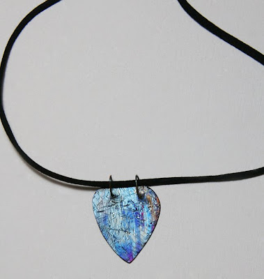 Amber Allena Jewelry: Titanium Guitar Pick Necklace custom for Bailey
