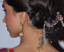 CINE ENTERTAINMENT: Deepika redesigns the 'RK' tattoo