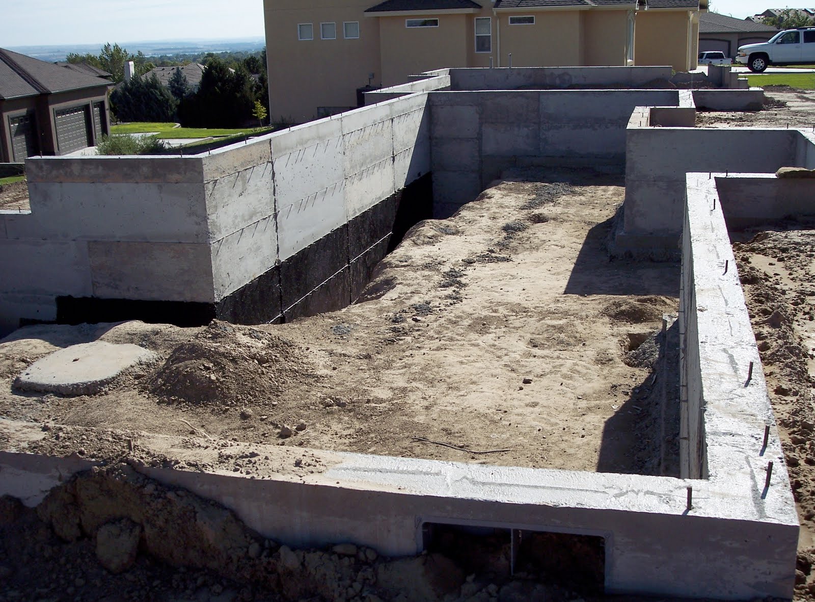 Building a Home: Foundation Walls Backfilled